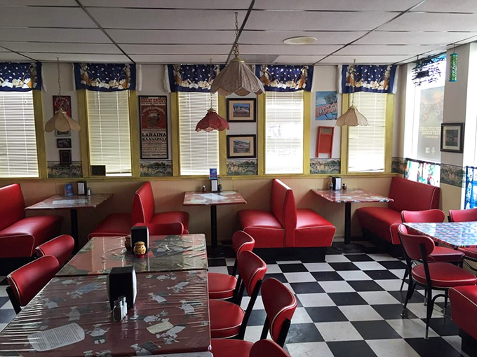 Red booths and checkered tablecloths create the perfect backdrop for family dinners, while vintage posters tell stories of Route 66 adventures.