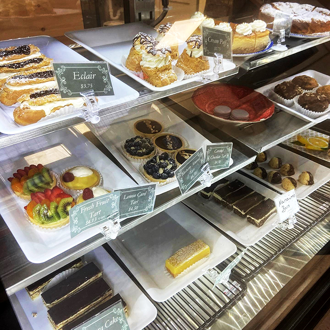Behold, the glass case of temptation! Choosing just one treat? Mission Impossible: Pastry Protocol.