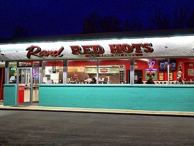 When the neon glows against the evening sky, Rand Red Hots transforms into a beacon of comfort food calling you home.