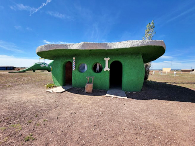 This cave-dwelling would make Fred and Wilma proud&mdash;complete with prehistoric-modern amenities and signature round windows.