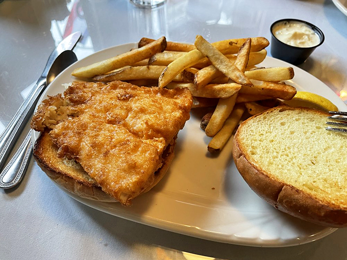 Golden-crisp haddock perches on fresh bread alongside perfectly crispy fries &ndash; a Maine classic that makes other sandwiches jealous.