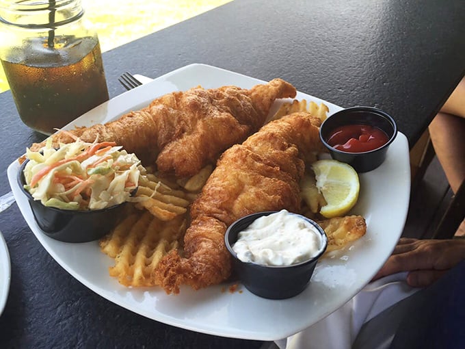 Golden-brown perfection: The beer-battered haddock arrives crispy on the outside, flaky on the inside, with all the fixings.