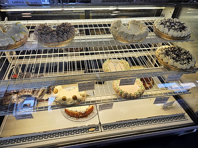 Pie paradise alert! This display case is like a museum of deliciousness, showcasing edible works of art that would make even Grandma jealous.