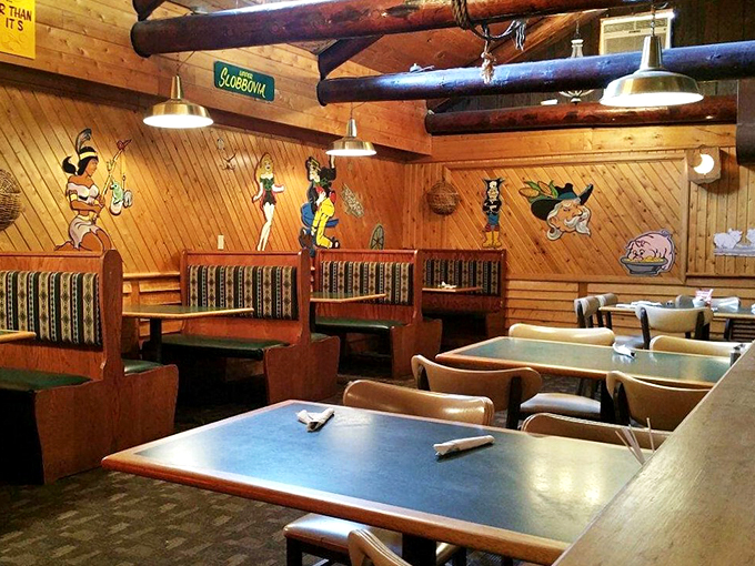 Step into a world where vintage comics meet comfort dining&mdash;red vinyl booths and character cutouts transport you to simpler times.