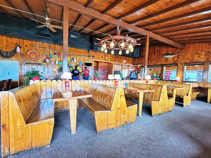 Rustic charm meets maritime memories - those colorful buoys aren't just decoration, they're chapters in Bailey Island's seafaring story.