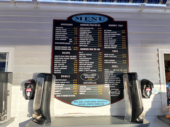 Behold, the sacred text of seafood lovers! This menu board is like a treasure map, with X marking the spot for your taste buds' next adventure.