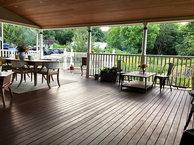 The wraparound porch offers al fresco dining with a view that'll make you forget you're not in Tuscany. Photo credit: Dorothy Sieradzki
