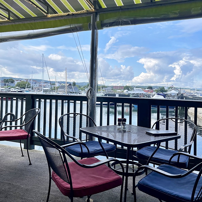 The covered deck offers front-row seats to nature's dinner theater, complete with harbor views and salty sea breezes.