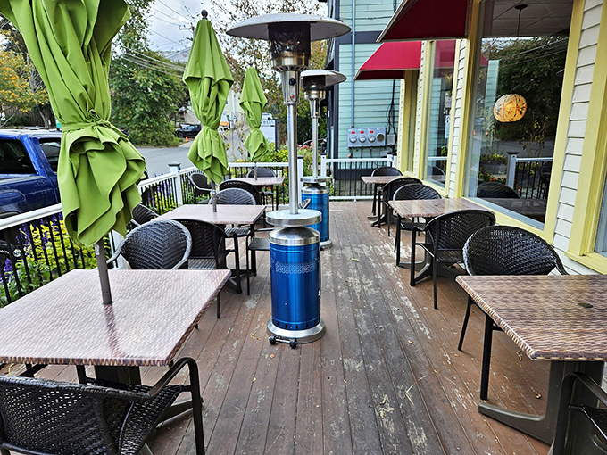 The outdoor deck offers a perfect summer escape, with heaters standing guard for those crisp Maine evenings. Photo credit: Jeffrey Laroco