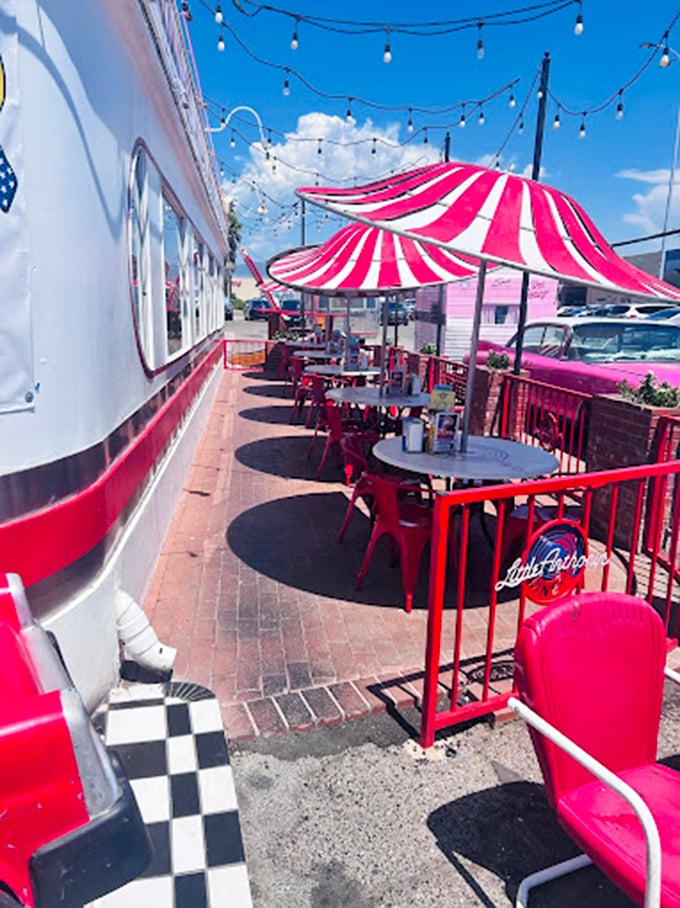 Candy-striped umbrellas and twinkling lights create the perfect desert oasis for enjoying those warm Tucson evenings under the stars.