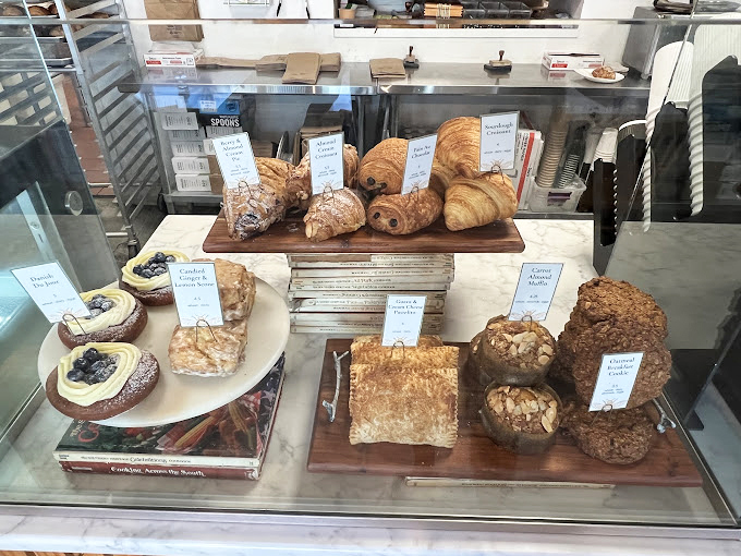 Behind this glass lies a treasure trove of buttery delights that would make a French baker weep with joy.
