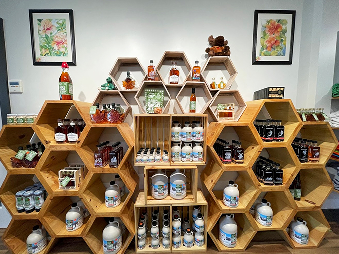 These honeycomb-shaped shelves aren't just clever design - they're buzzing with Vermont's liquid gold: pure maple syrup and local delicacies.