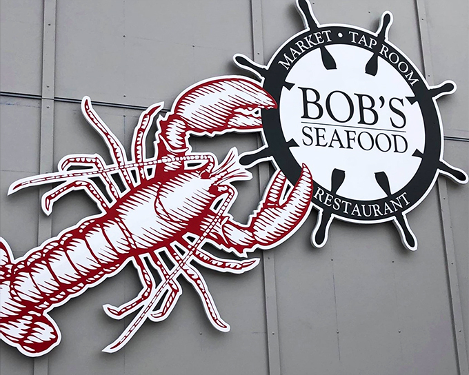 That giant red lobster isn't just a sign - it's a beacon of hope for seafood lovers, guiding hungry souls to their next great meal.