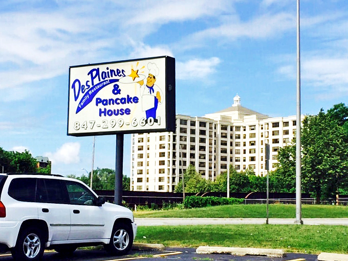 Standing tall against the suburban skyline, this sign promises pancake paradise to weary travelers and breakfast enthusiasts alike.