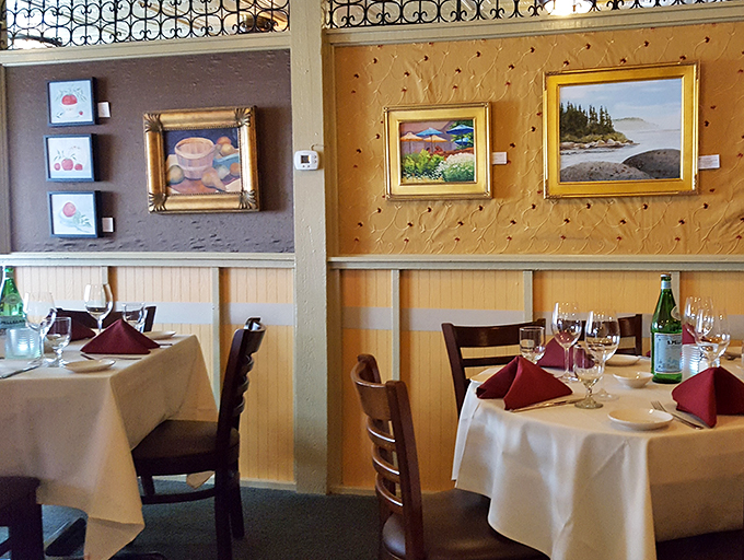 A feast for the eyes before the meal begins. Local artwork and cozy tables set the stage for an intimate Italian getaway in the heart of Boothbay Harbor.