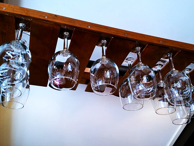 Rows of crystal soldiers, ready for duty. These glasses are about to embark on a mission to deliver liquid happiness.