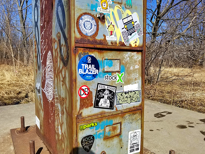 A closer look reveals a patchwork of stickers and graffiti. It's like the world's most vertical, unconventional scrapbook of Burlington's artistic spirit.