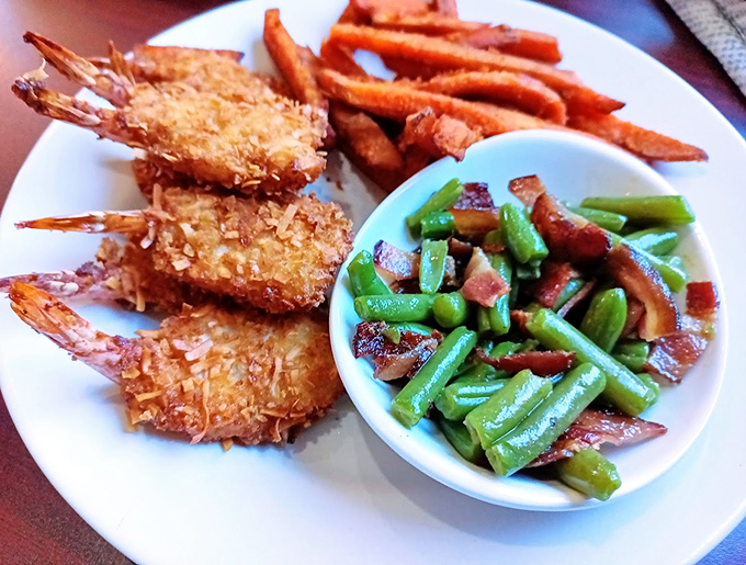 Surf's up in Michigan! These coconut shrimp are so crispy, you'll think you're on a tropical vacation. Don't forget to say 'aloha' to that zesty dipping sauce!
