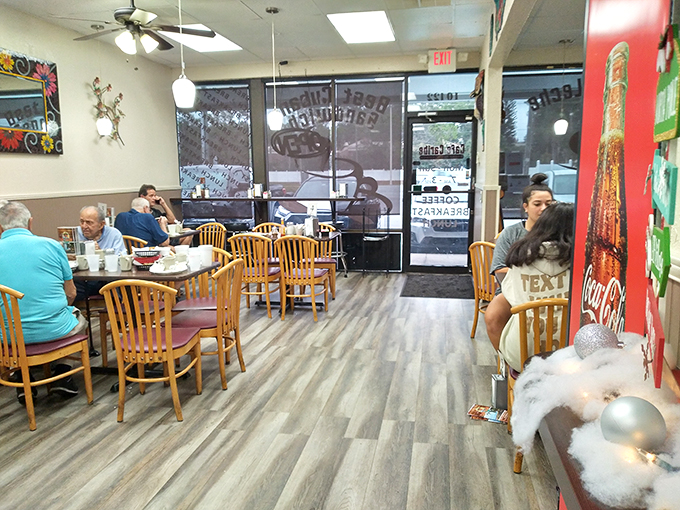 Cozy vibes and comfort food central. This dining area feels like your abuela's kitchen, if your abuela could cook for an entire neighborhood. Photo credit: Robert Negron