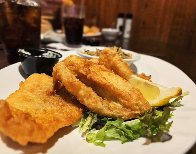 Golden treasures from the deep! These crispy morsels are so perfectly battered, they might just convince you that fish grew on trees in a parallel universe.