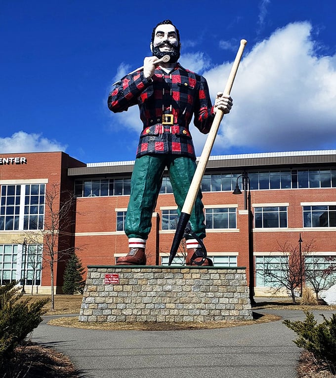 "I mustache you a question," Paul seems to say. This gentle giant's grin is as wide as the Maine woods, welcoming visitors with open arms.