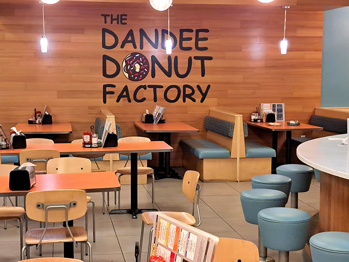 Step into a world where calories don't count. The Dandee Donut Factory's interior is like a retro diner met a modern café and had a delicious love child.