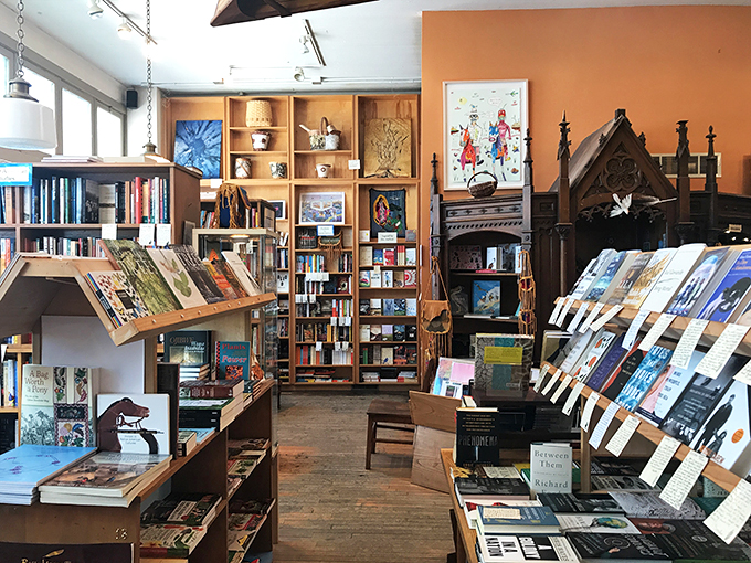Imagine if your eccentric aunt's attic and a library had a baby – that's the vibe of this cozy book nook.
