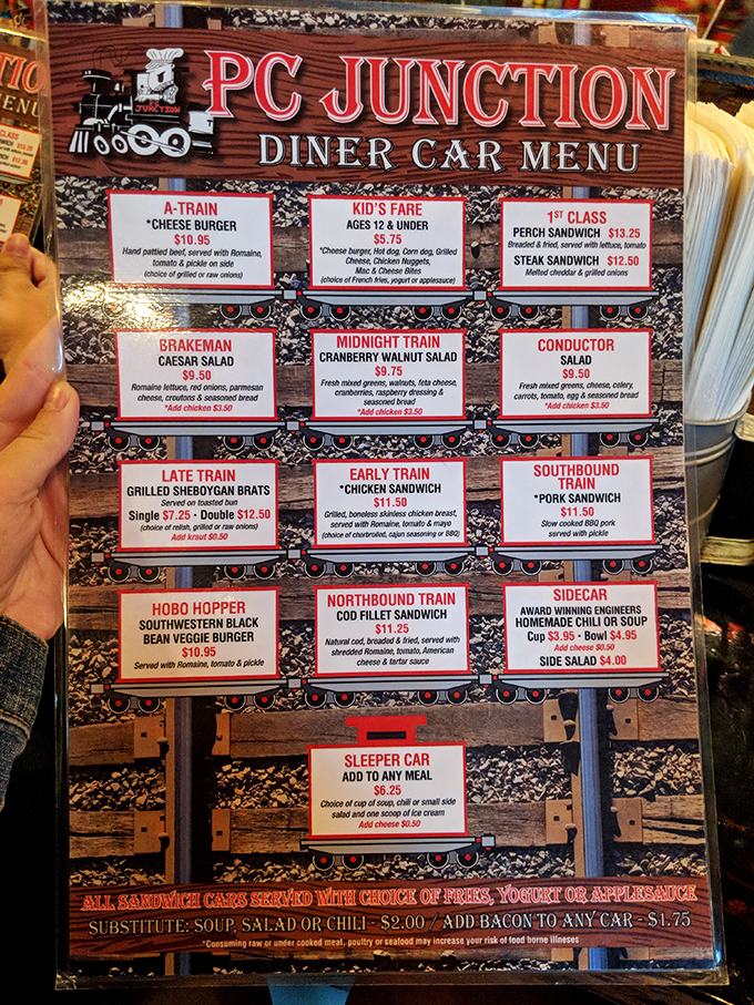 Choo-choo-choose your meal! This playful menu turns ordering into a delightful game of "I spy" with train-themed dishes that'll make you grin.