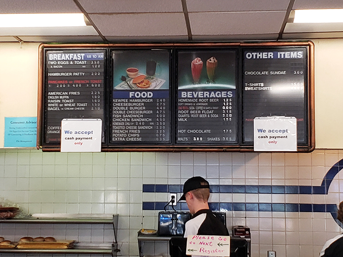Decisions, decisions! This menu board's like a greatest hits album of diner classics. Pro tip: Everything pairs well with a side of nostalgia.