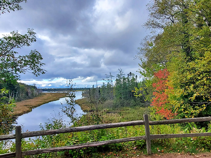 Where autumn paints the shoreline in watercolor hues, and every vista feels like a Bob Ross masterpiece come alive.
