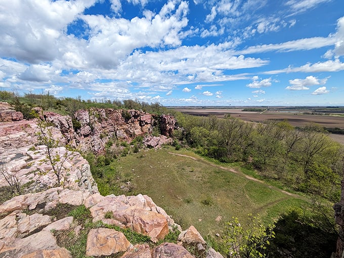 Prairie meets sky in a geological tango! These quartzite cliffs are nature's skyscrapers, minus the traffic and overpriced coffee. Photo credit: Felix Mattstedt