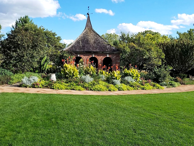 Garden goals! This floral archway is like nature's version of a red carpet, minus the paparazzi and uncomfortable shoes.