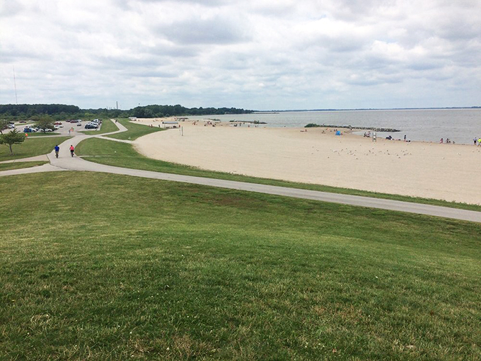 Green meets blue in a Midwestern masterpiece. Lush grass gives way to golden sands &ndash; nature's perfect gradient. Photo credit: Jennifer Y.