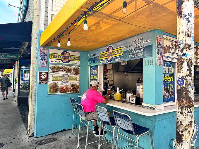 The Conch Shack: Key West's tiny blue flavor powerhouse! It's like a TARDIS for your taste buds &ndash; smaller on the outside, enormous flavors inside.