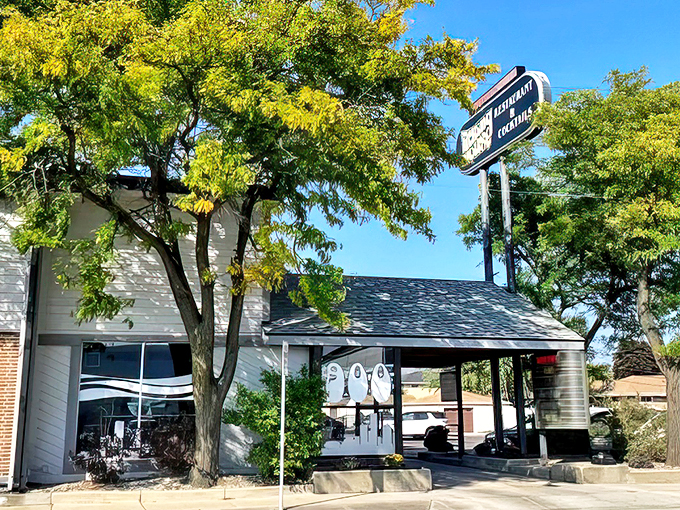 Classic mid-century design meets modern comfort at this Milwaukee mainstay, where the neon sign promises good times ahead.
