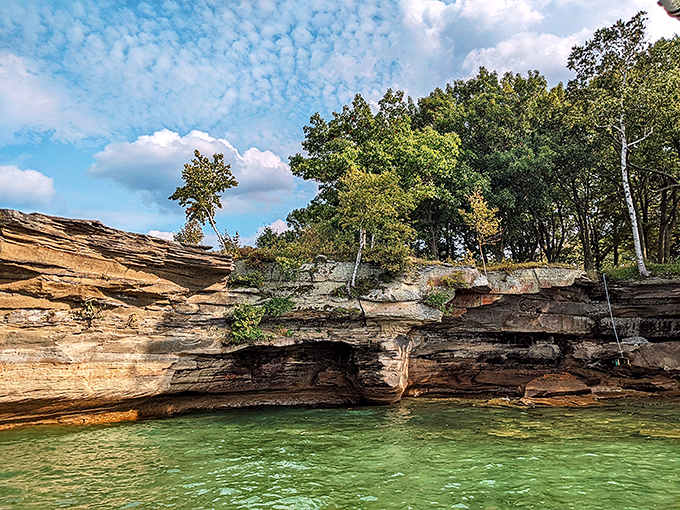 Turnip Rock: Nature's attempt at Jenga! This top-heavy island looks ready to waddle off into Lake Huron's sunset.