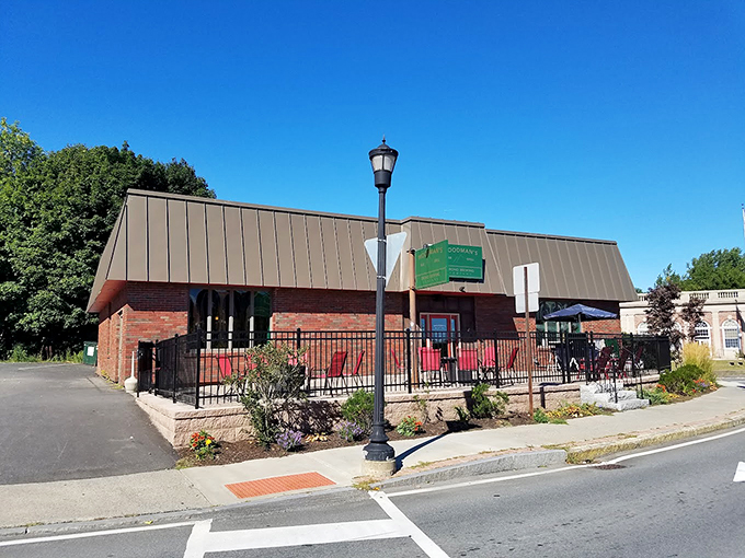 Woodman's: Where "Bar & Grill" isn't just a name, it's a promise. That green sign? It's not envy you're feeling&mdash;it's hunger.