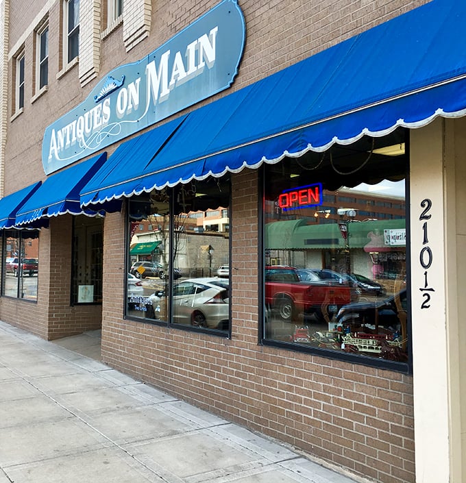 Blue awnings and bygone treasures! Step into a world where every item has a tale to tell – and probably a layer of dust to dust off. Photo credit: C Markuson