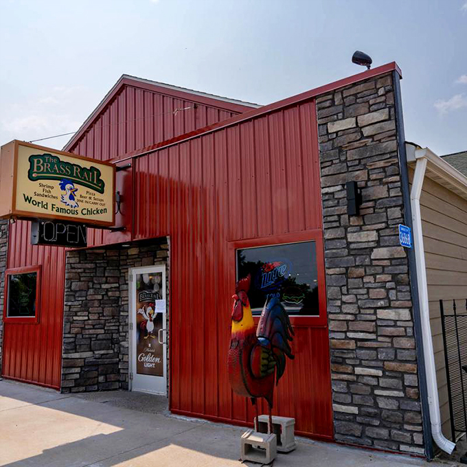 Stone-faced exterior, heart of culinary gold! This unassuming gem hides flavors that'll rock your world. Photo credit: The Brass Rail