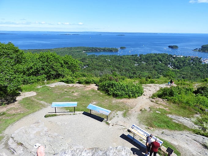 Perched atop Camden's rocky throne, drinking in views that'd make a postcard photographer weep with joy.