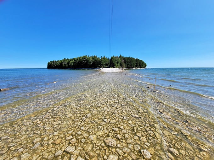 This 1869 diva of Door County stands proudly on its own island, serving "don't talk to me until I've had my coffee" vibes. 
