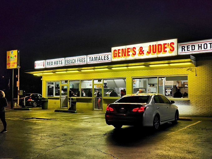 Neon lights and meaty delights! This hot dog stand is like a 1950s sock hop for your taste buds.