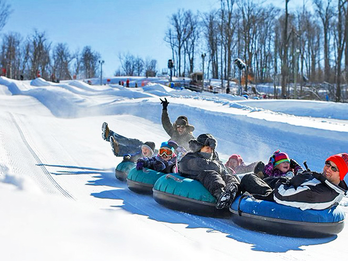 Tubing: Where dignity takes a backseat to pure, unadulterated joy. Wheee!