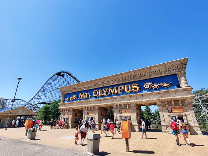 Greek columns and mythological grandeur frame this waterpark entrance, where mere mortals become aquatic gods for a day.