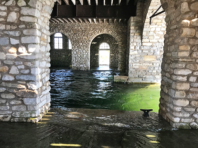 Indiana Jones, eat your heart out! This stone archway leads to a watery wonderland. No snakes, just refreshing Lake Michigan vibes.