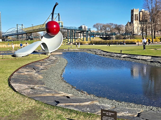 Who says you can't play with your food? This cherry-topped spoon proves that art can be both monumental and deliciously whimsical.