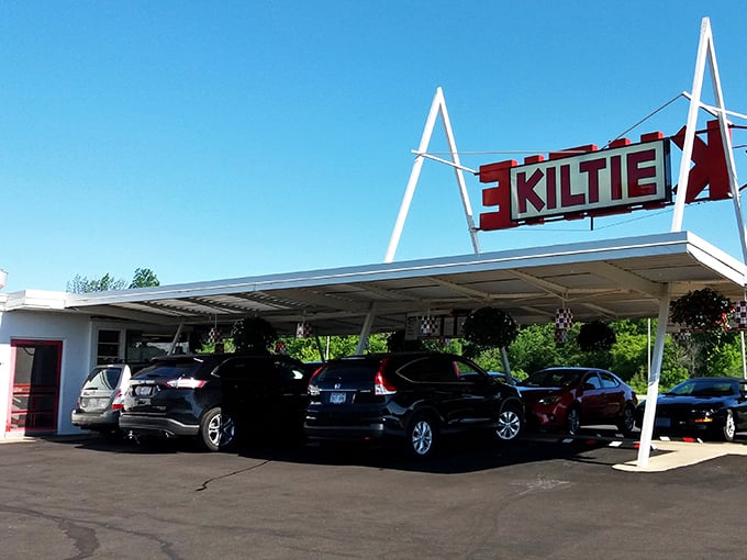 Sunshine, cars, and The Kiltie's timeless charm. It's like stepping into a Norman Rockwell painting, but with better burgers.