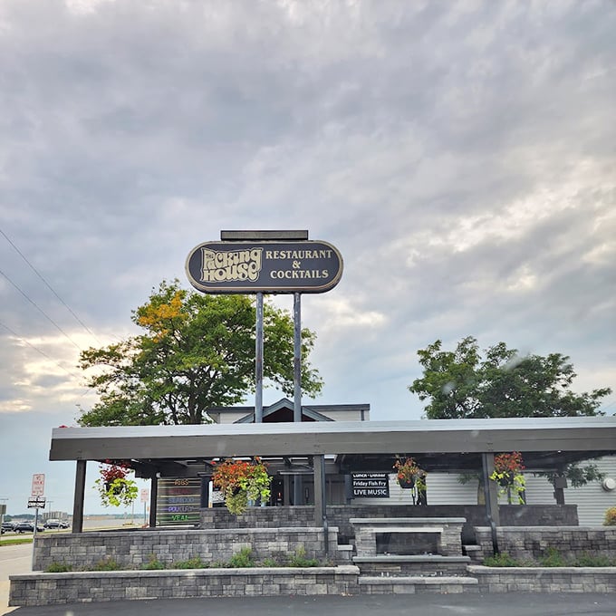 The stone facade and retro signage transport you back to the golden age of supper clubs.