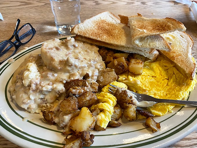 Biscuits and gravy and eggs, oh my! This plate is the breakfast equivalent of a warm hug from your favorite aunt.