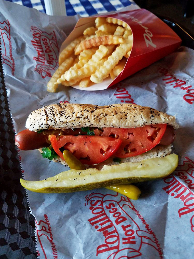 This Chicago dog is dressed to impress! It's got more toppings than a milliner's shop, and those crinkle-cut fries? Pure potato perfection.